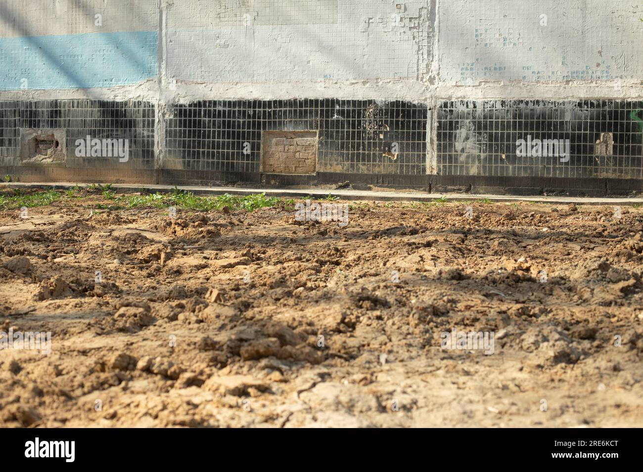 Construction near house. Excavated earth. Excavated soil. Construction ...