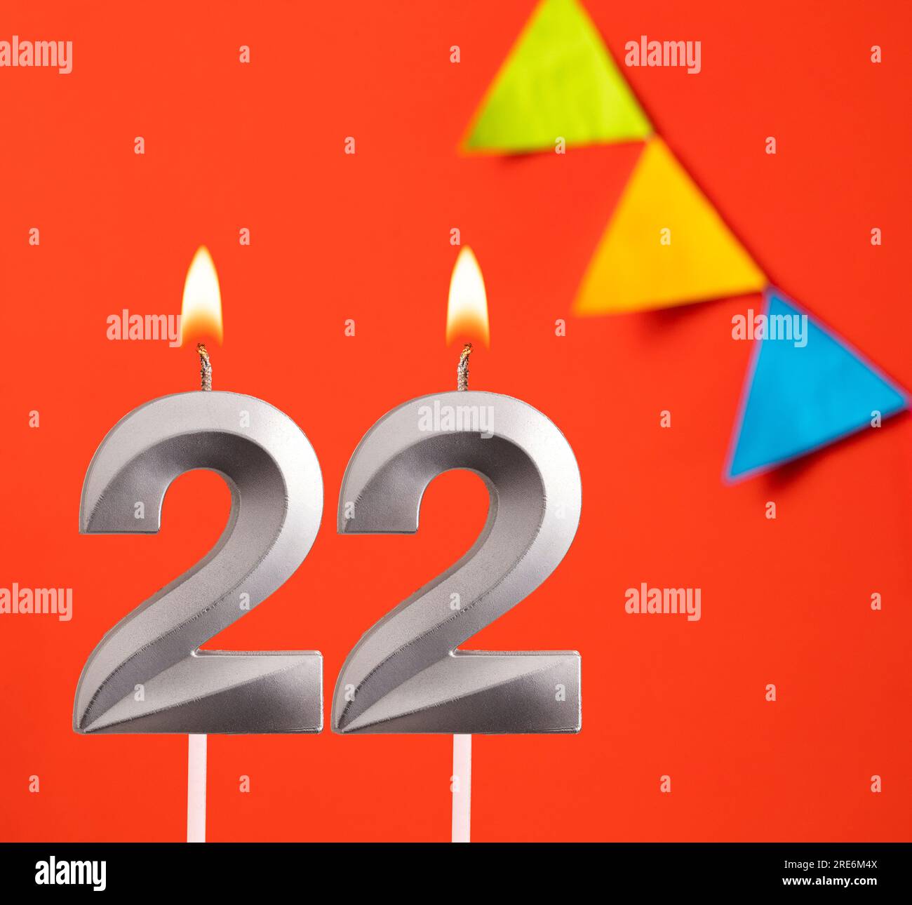 Birthday card - Number 22 candle in orange background Stock Photo - Alamy