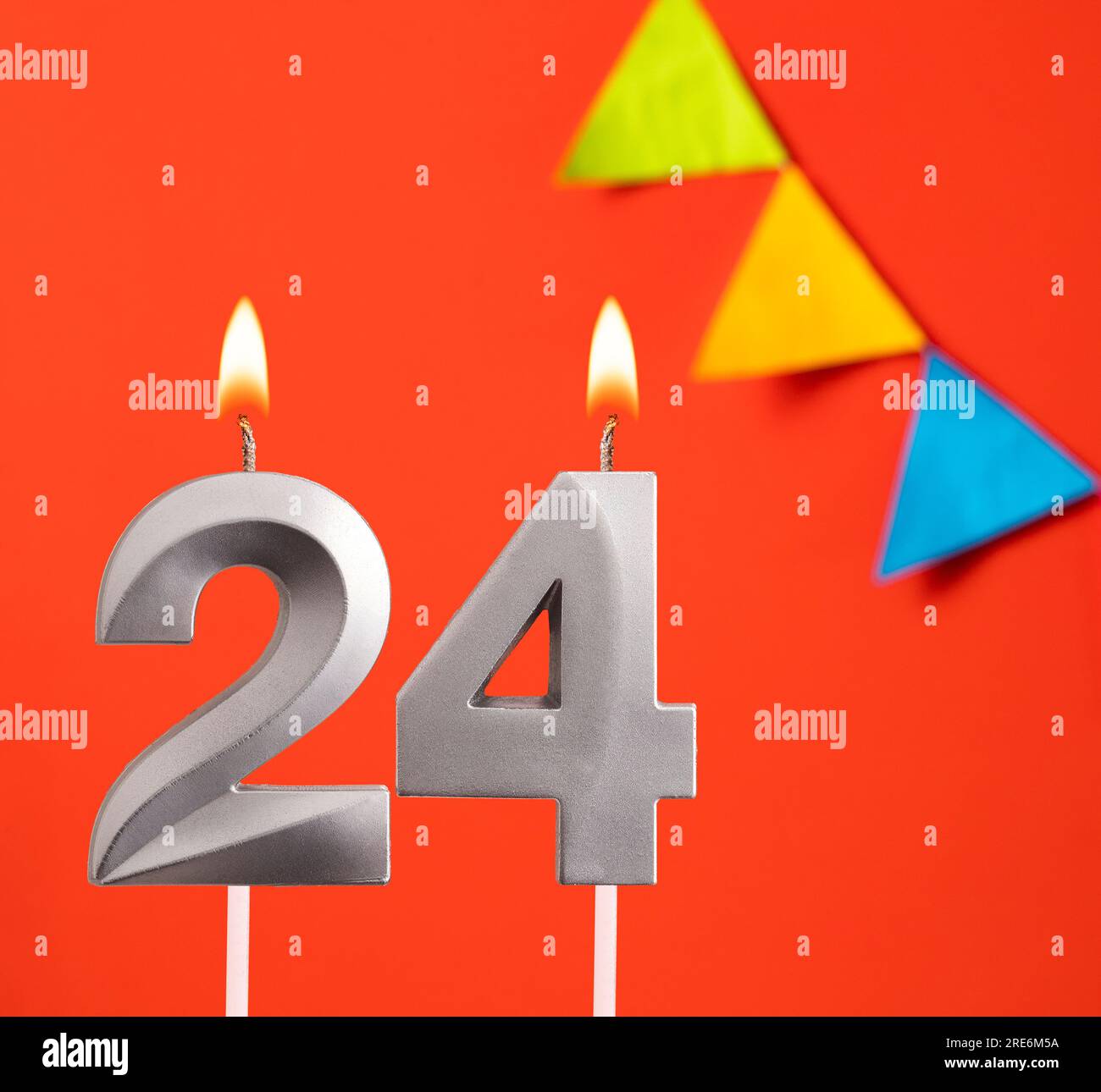 Birthday card - Number 24 candle in orange background Stock Photo - Alamy