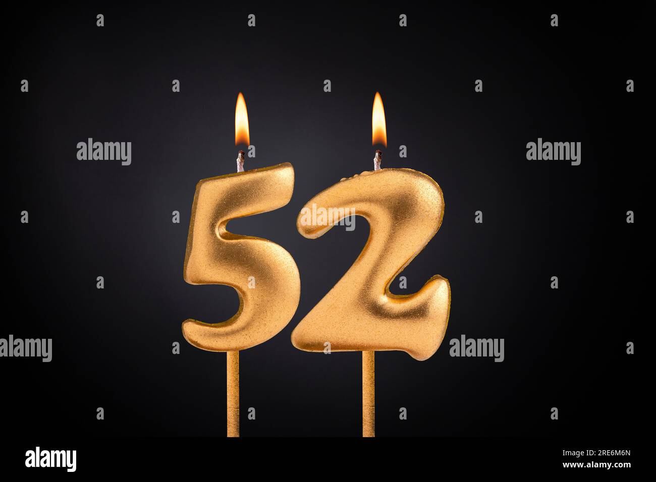 Birthday candle number 52 - Birthday celebration on black background ...