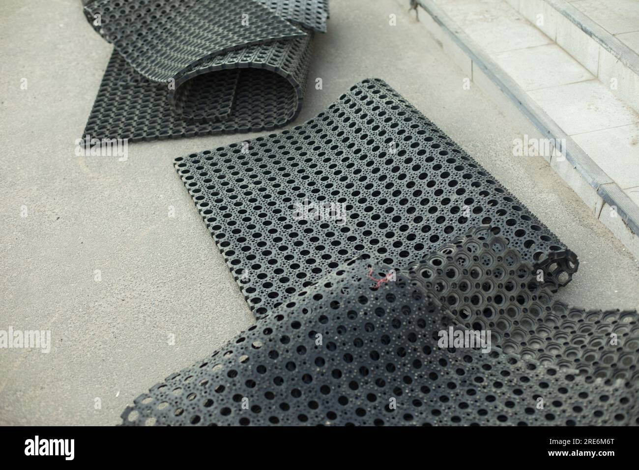 Rubber mat. Carpet in dust. Rubber coating. Cleaning mat. Cleaning from ...