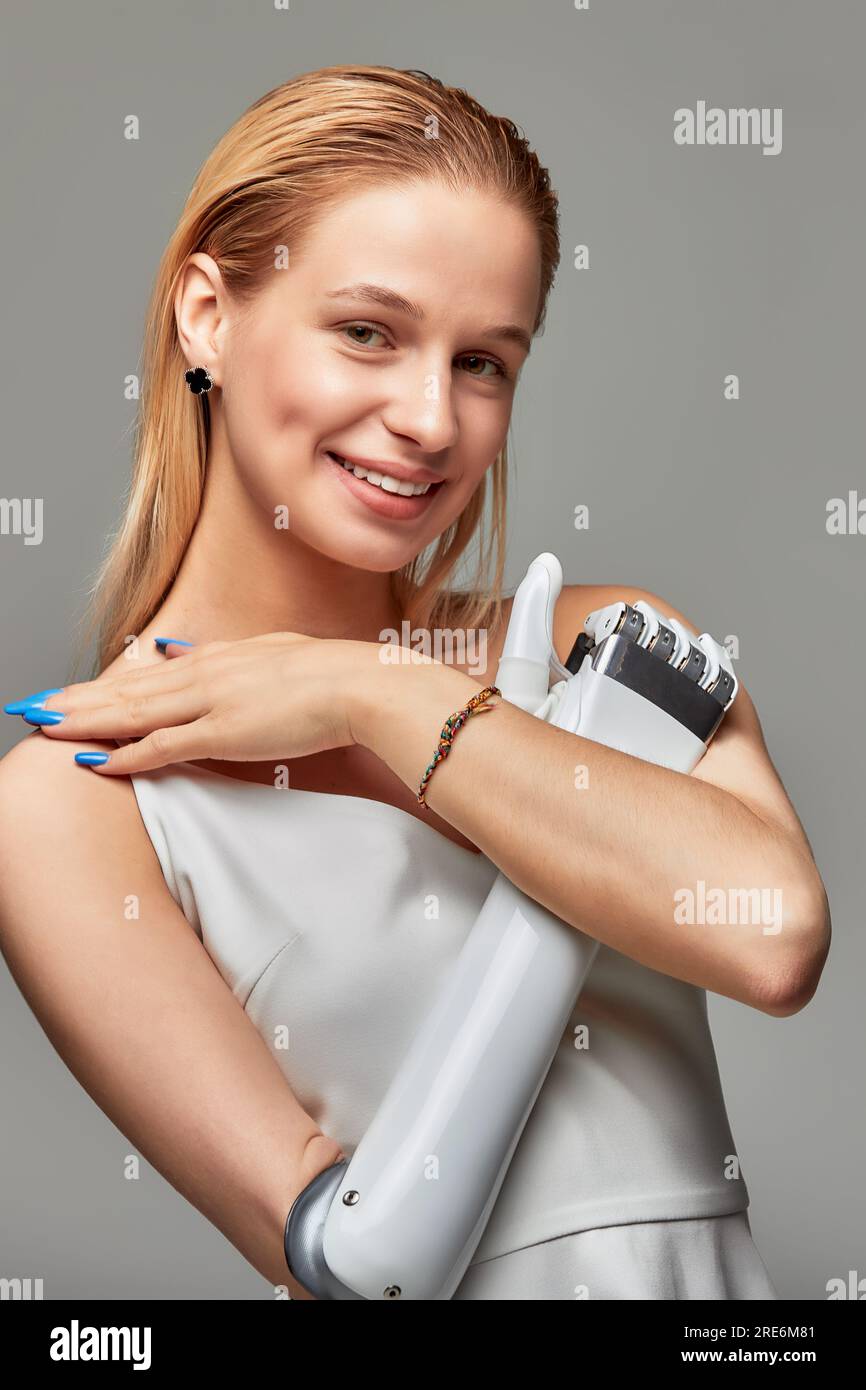 Studio portrait of beautiful young girl with disability wearing sensory ...