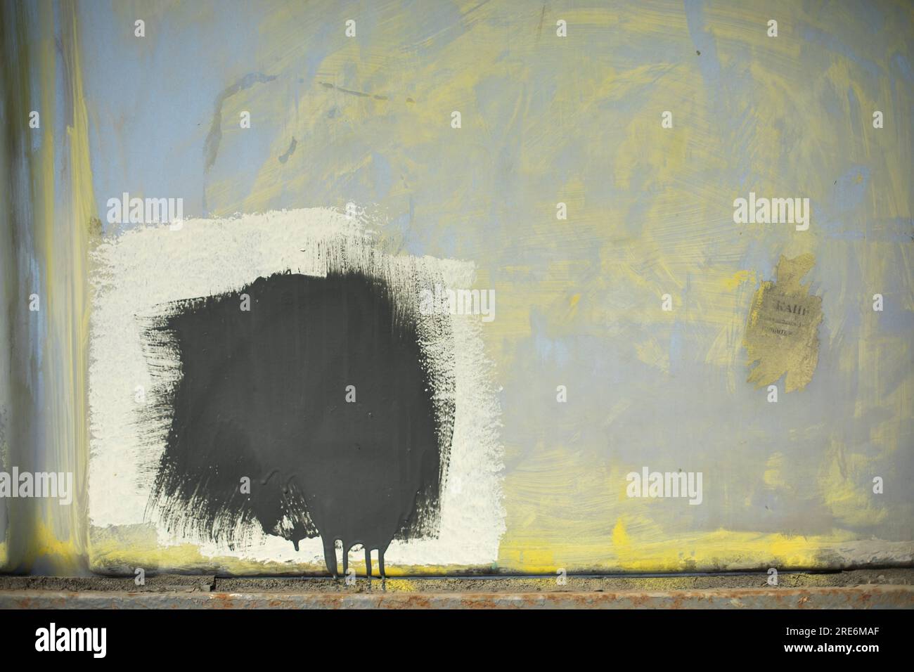 Painted inscription on wall. Vandalism in city. Paint stain. Texture of ...