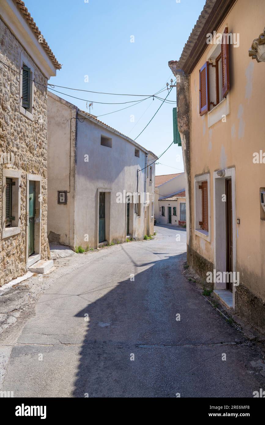 Street with old buildings in Lakones village, Corfu, Greece Stock Photo ...