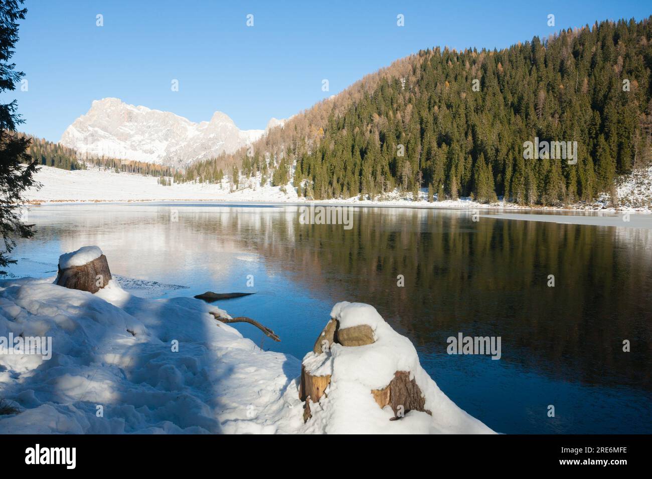 Alpine lake with dolomites in background, Calaita lake in winter season ...