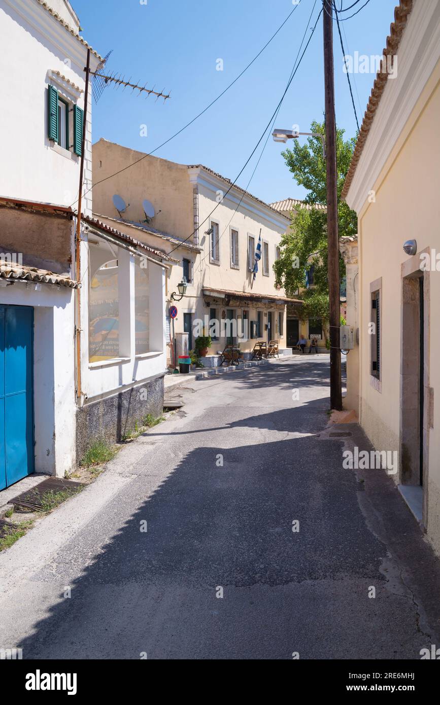 Street with old buildings in Lakones village, Corfu, Greece Stock Photo ...