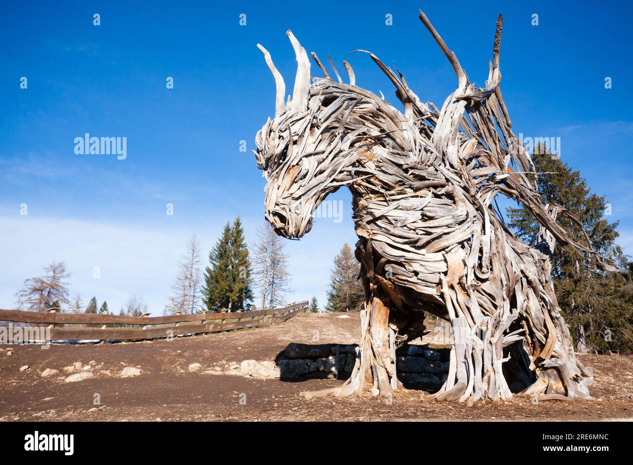 Wooden sculpture of a dragon made of tree branches. Vaia tempest dragon ...