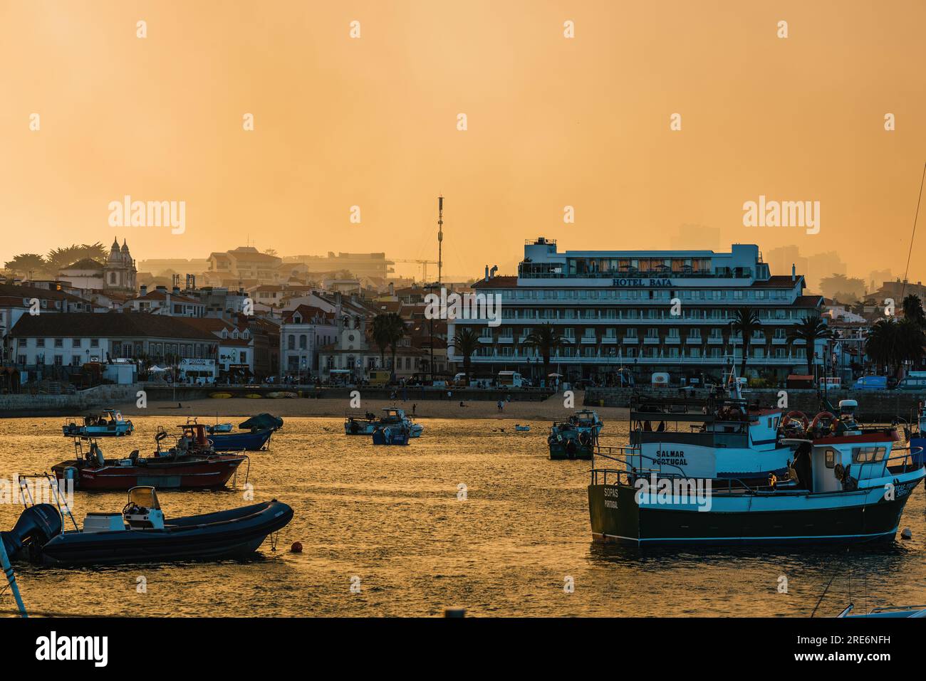 View of Cascais Bay with orange hazed sky due to close by forest fires ...
