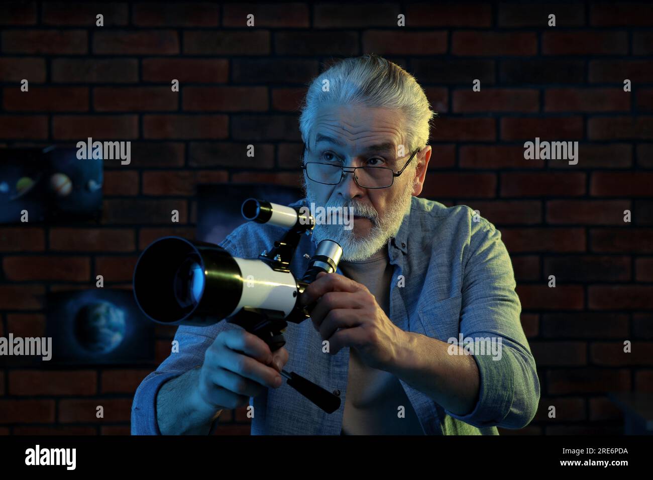 Person using telescope at night hi-res stock photography and images - Alamy