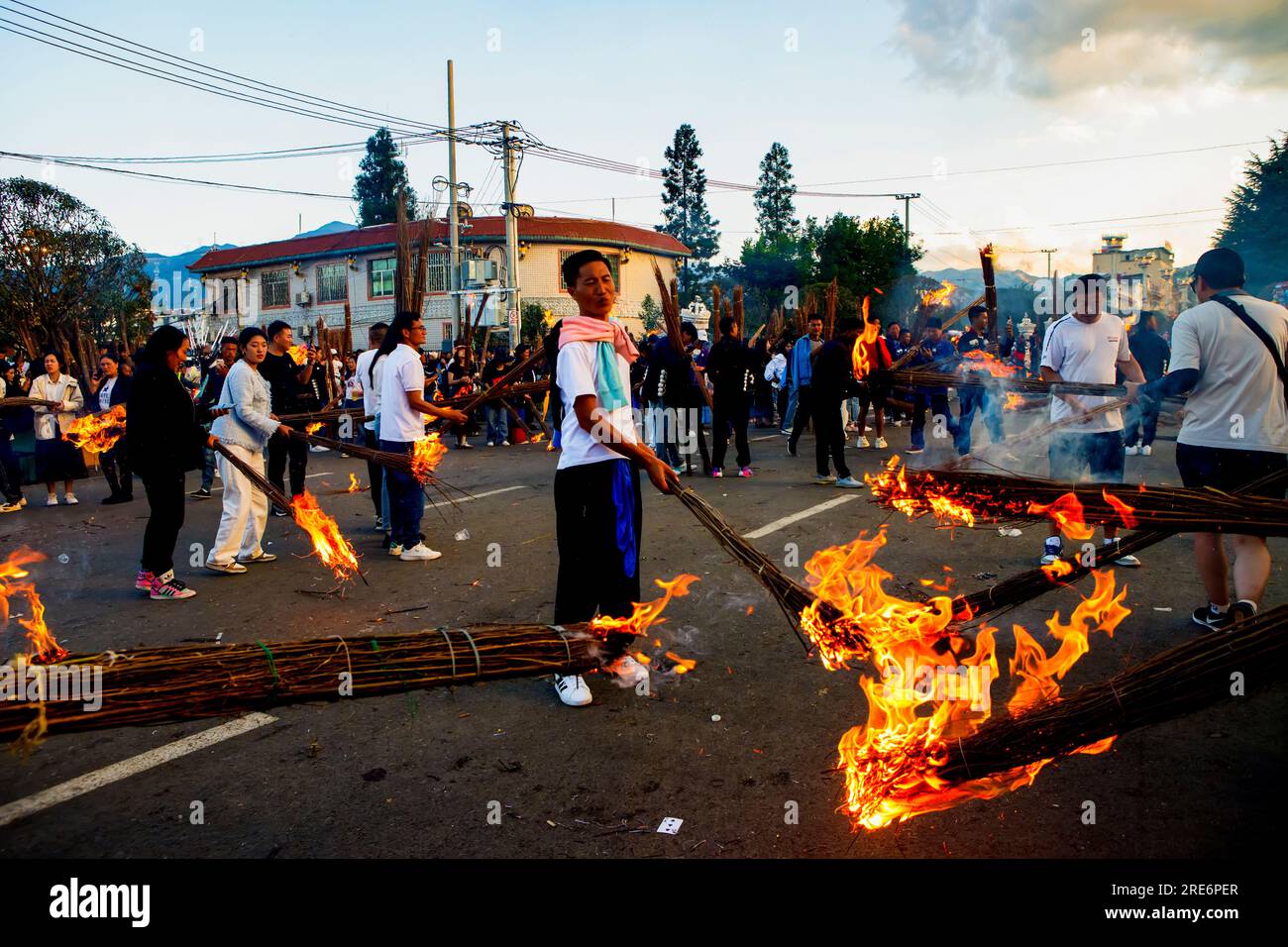 SICHUAN, CHINA - JULY 23, 2023 - People light torches to celebrate the ...