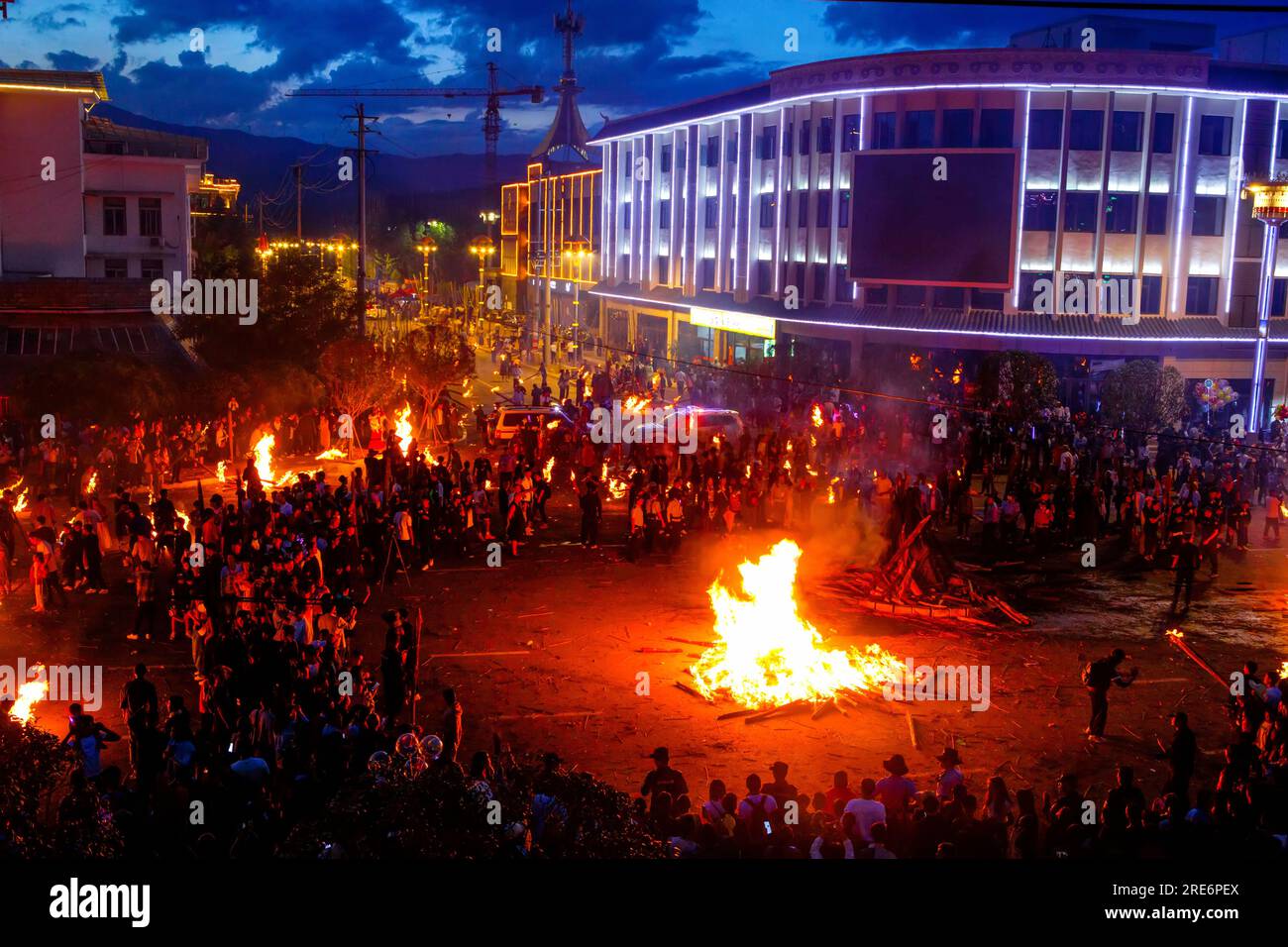 SICHUAN, CHINA - JULY 23, 2023 - People light torches to celebrate the ...