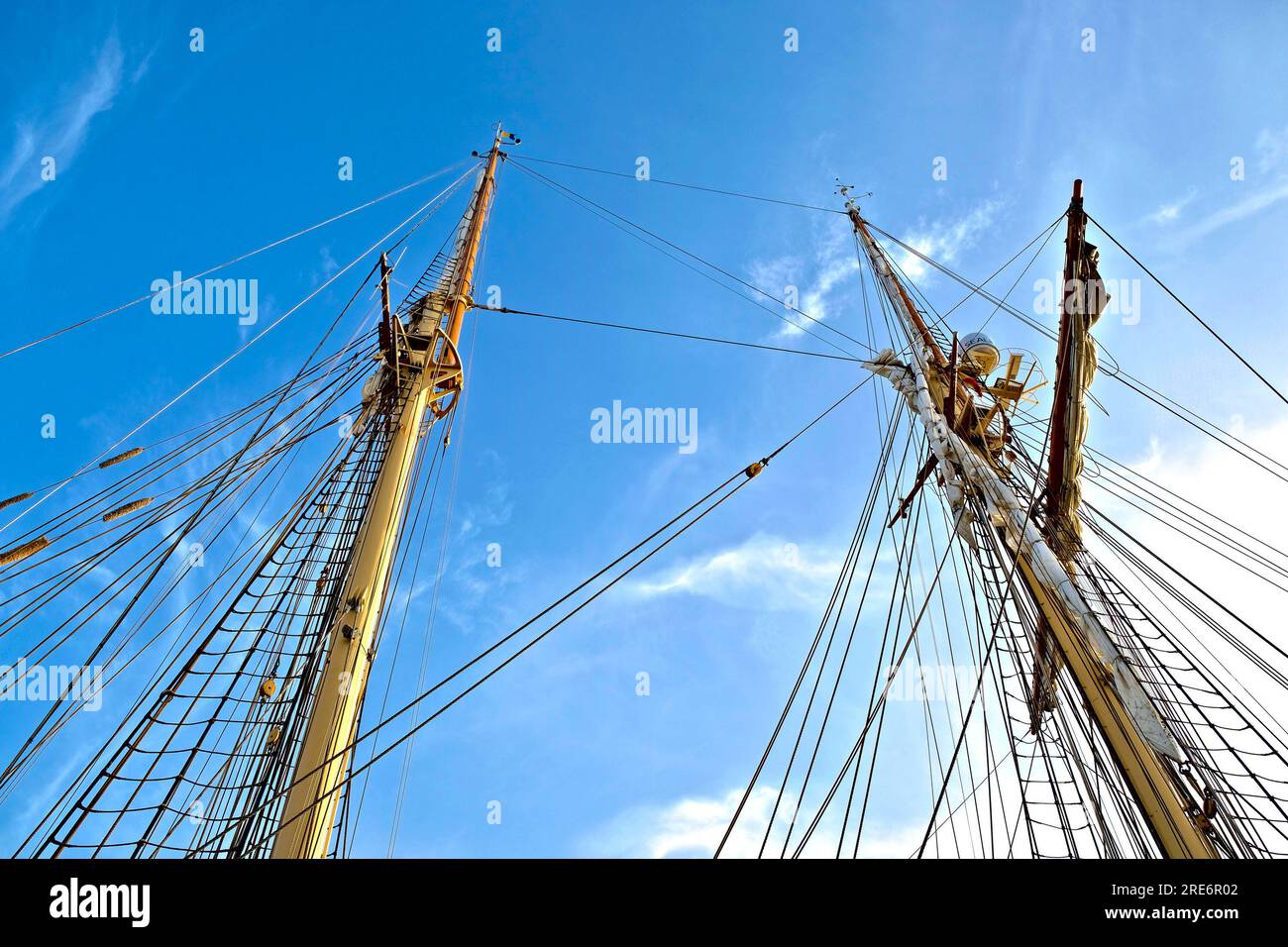 Tall masts and rigging of a classic sailing ship. Blue skye in the ...