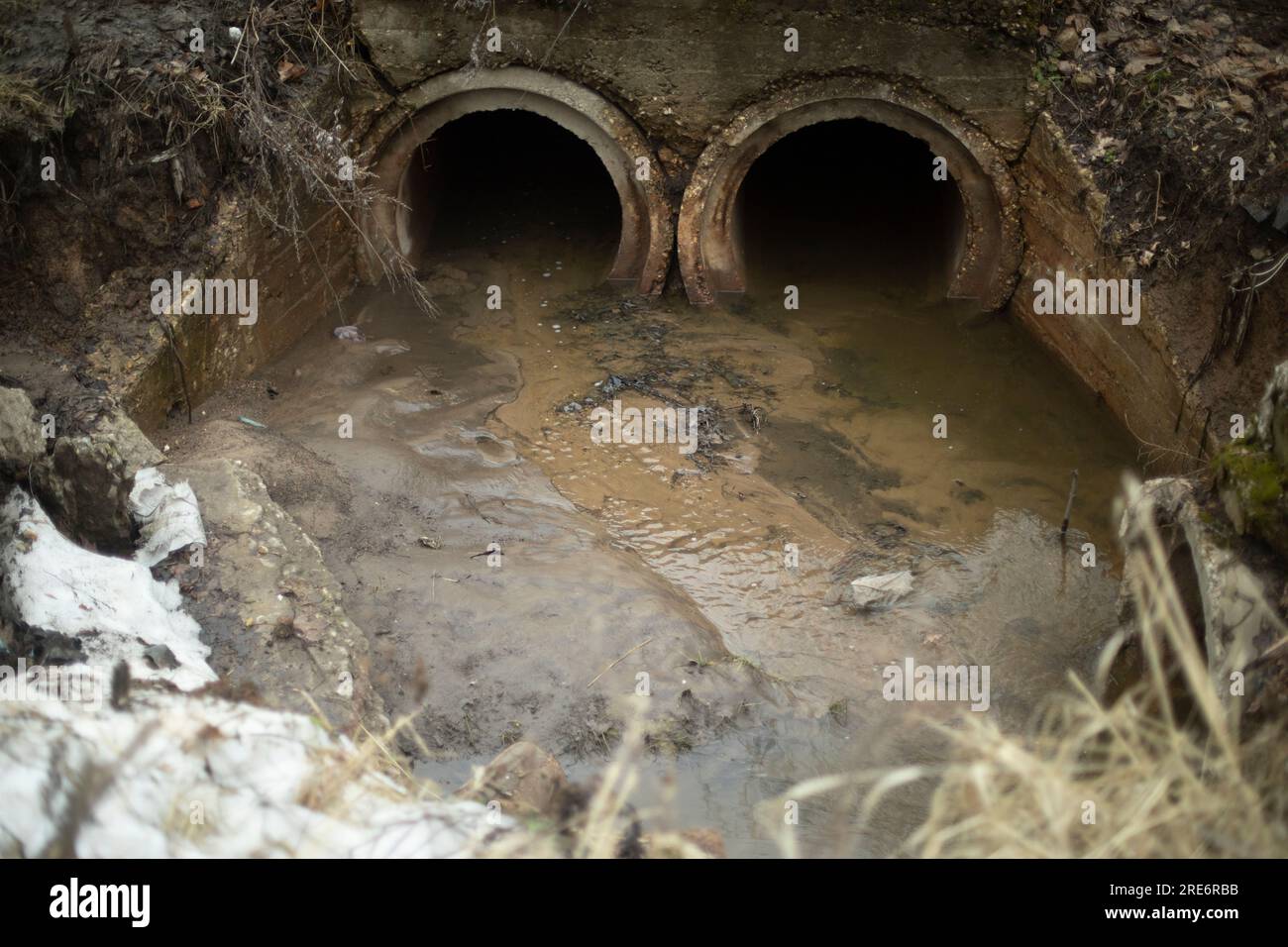 Pipes in ground. Draining water. Industrial waste. Duct under road ...