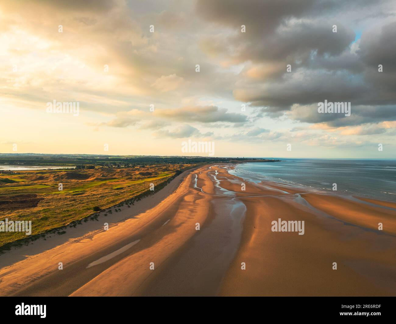 Golden evening light on Donabate Beach on the summer solstice Stock ...