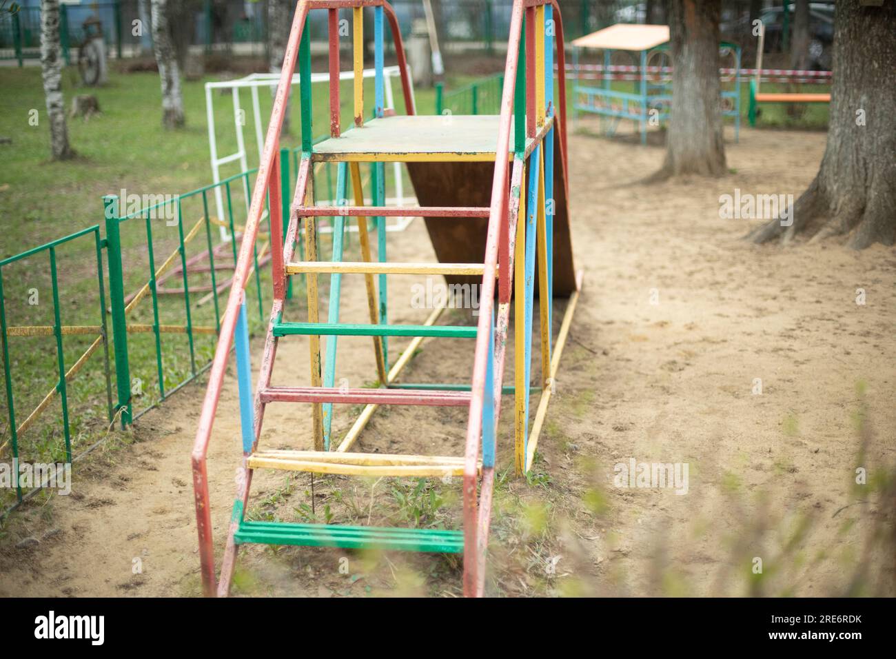 Children's playground. Old slide for children. Children's area. Steel ...