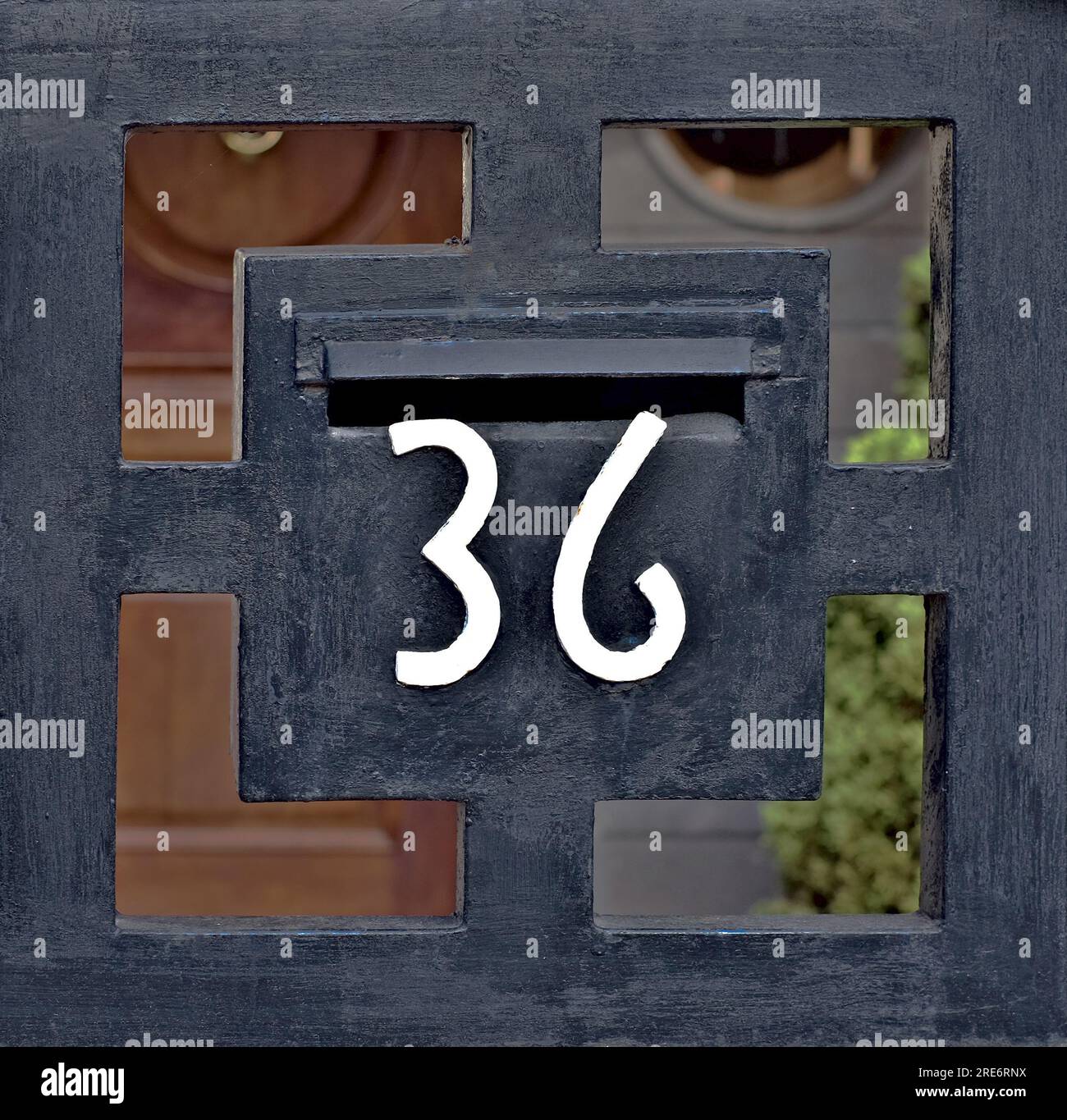 Number 36, thirty-six, white on a black original letter box Stock Photo ...