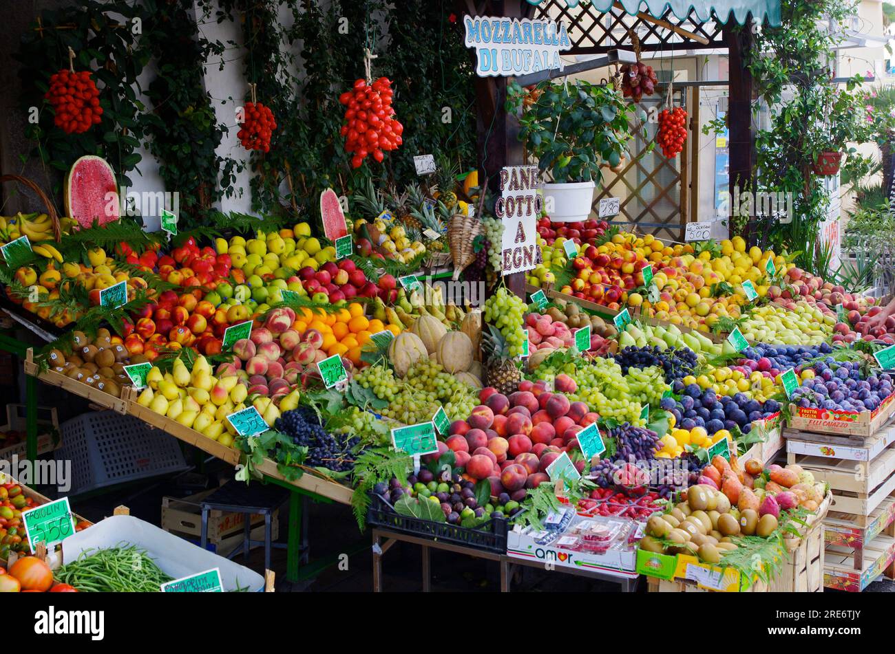 Fruitshop display in Forio on the Island of Ischia. with signs for ...