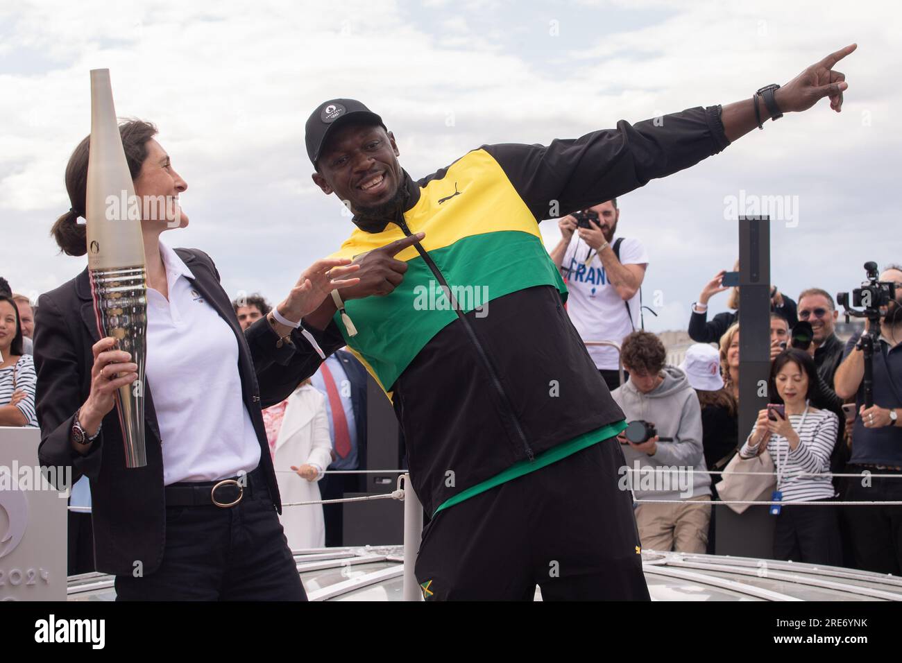 Paris, France. 25th July, 2023. Jamaican sprinter Usain Bolt (R ...