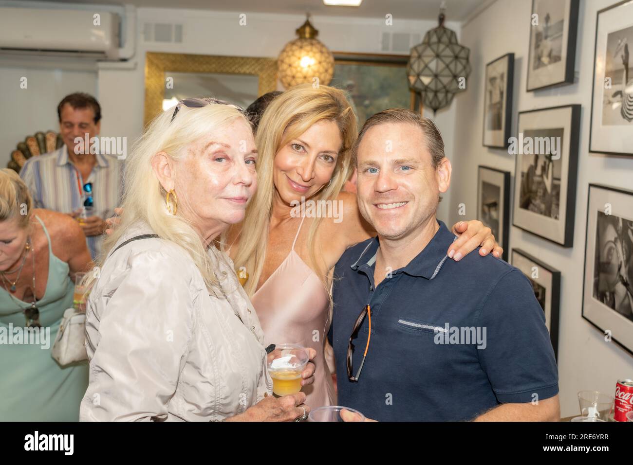 Guest, Rhonda Lovings and guest attend Artist Luciana Pampalone ...