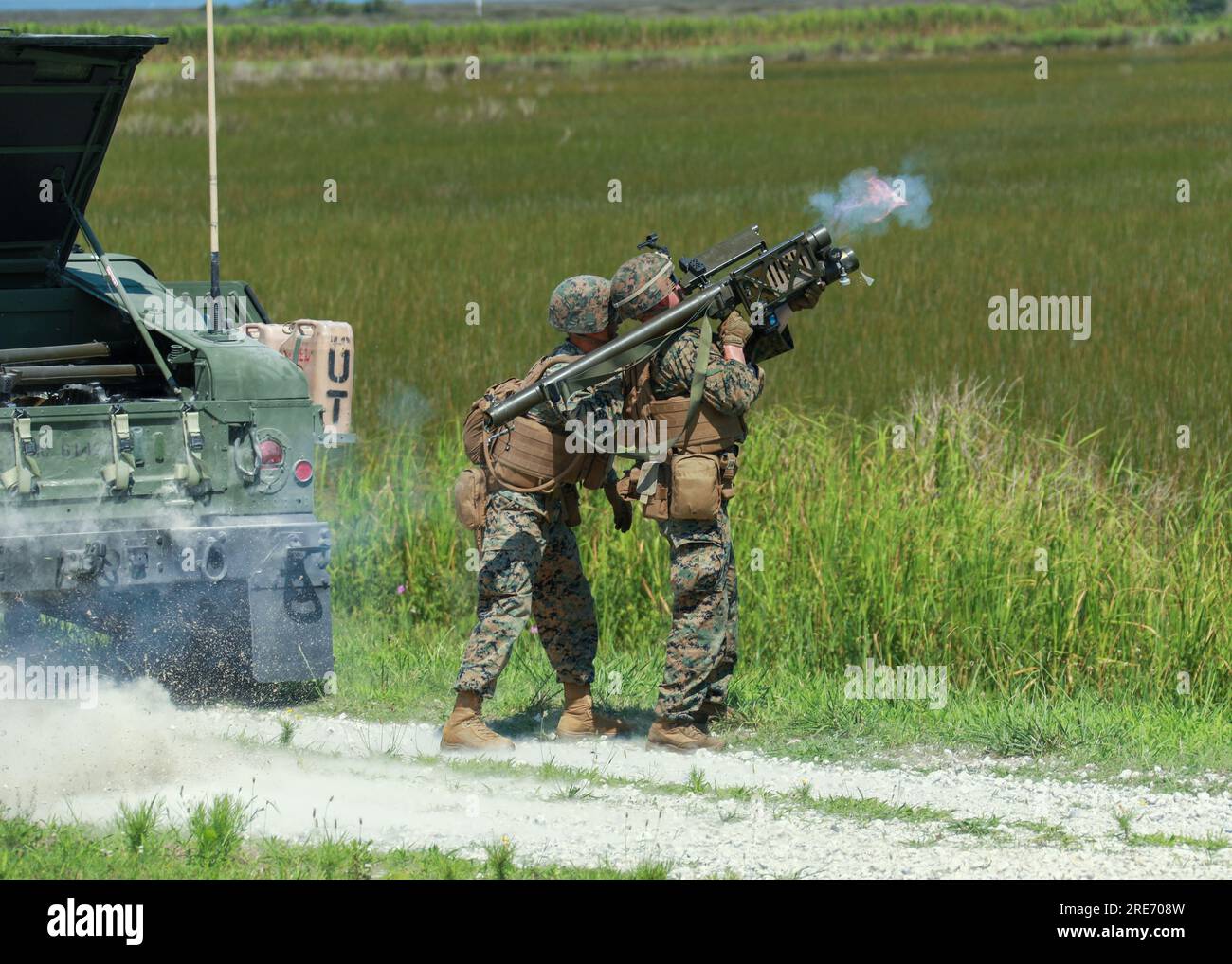 U.S. Marines with 2nd Low Altitude Air Defense (LAAD) Battalion, fire a ...