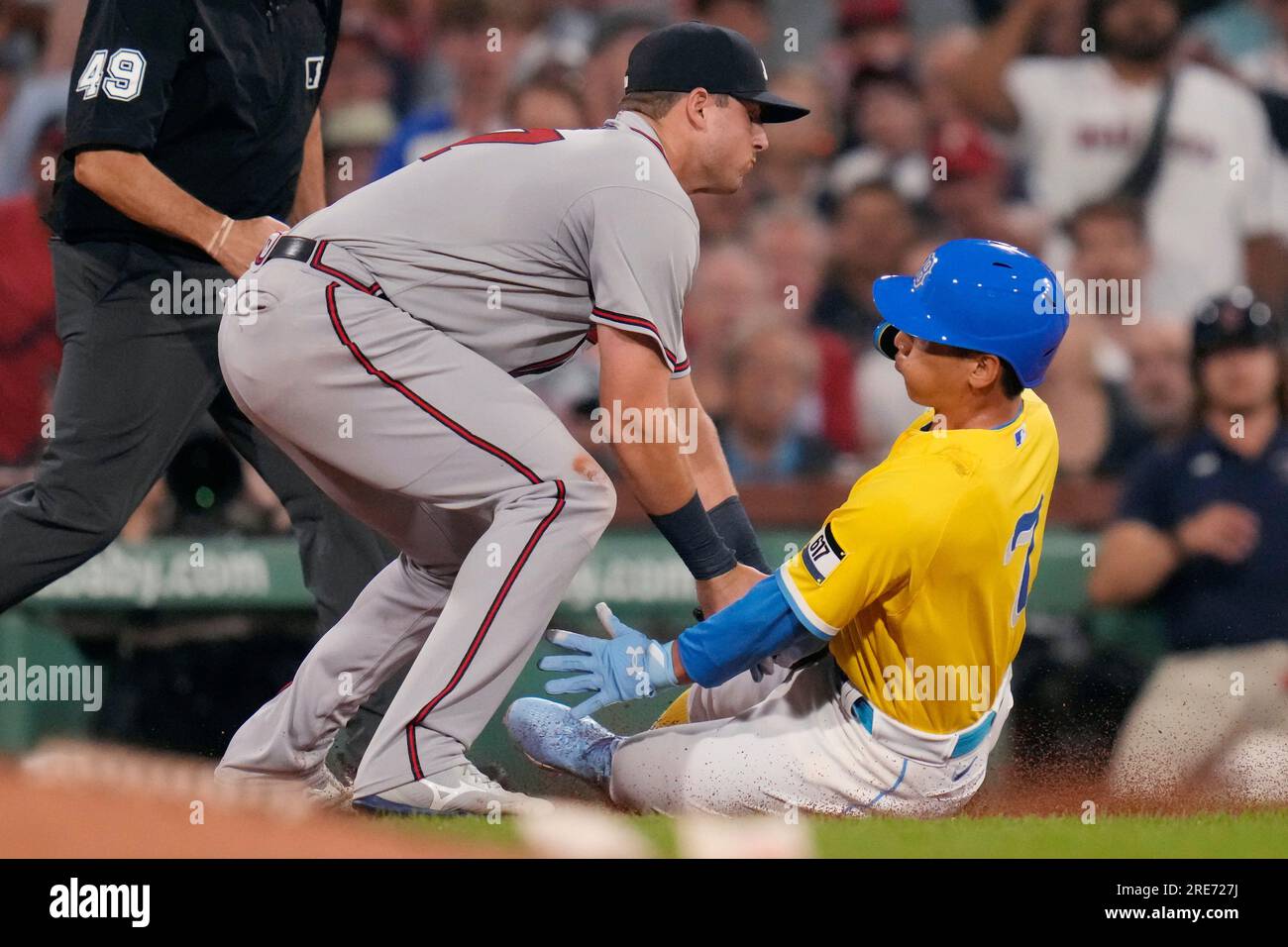 Atlanta Braves third baseman Austin Riley, left, tags out Boston Red ...