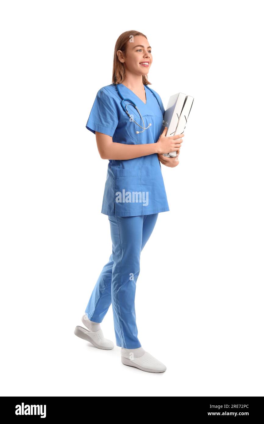 Female nurse with folders on white background Stock Photo - Alamy