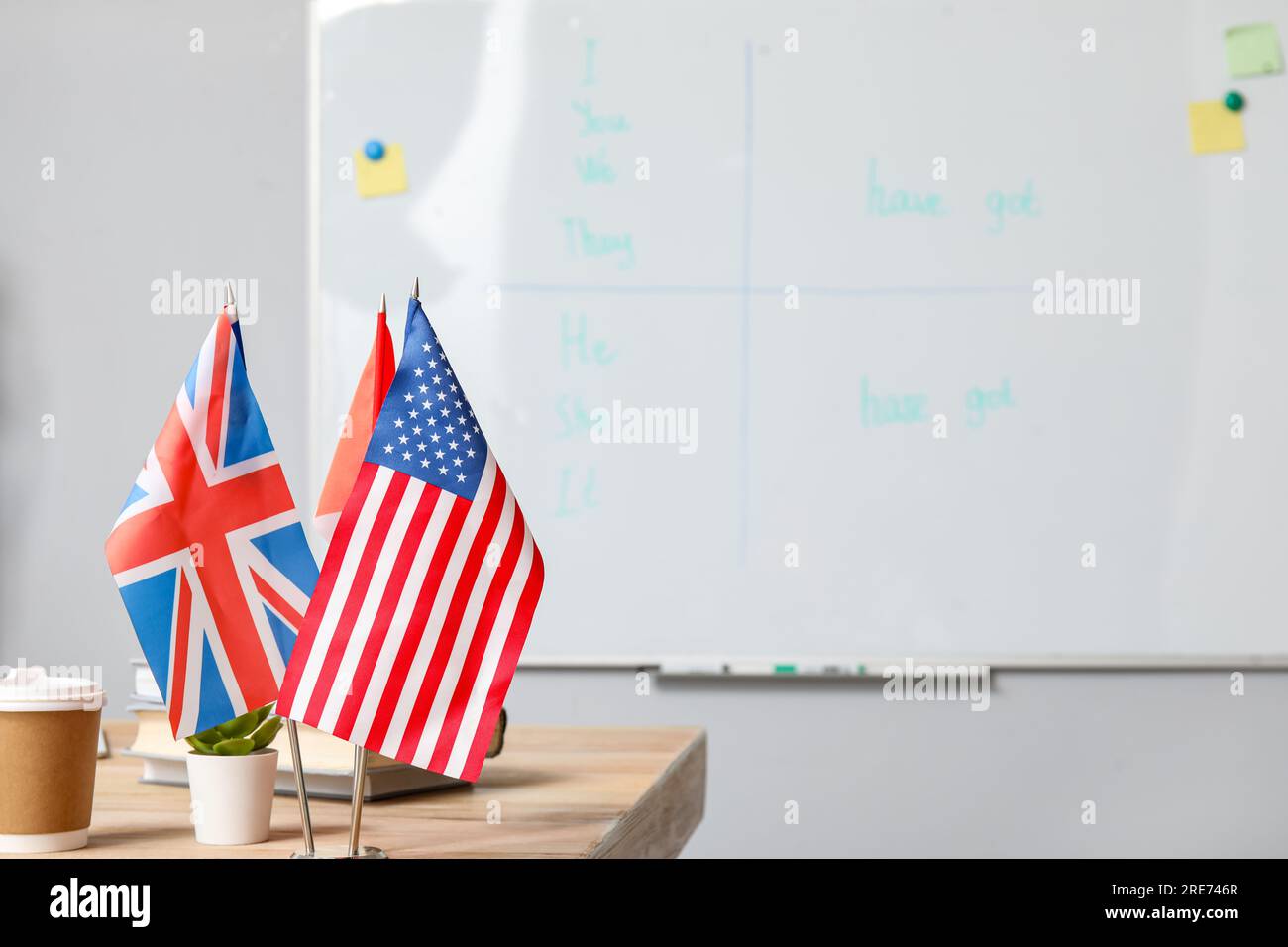 Different flags on table in English classroom, closeup Stock Photo - Alamy