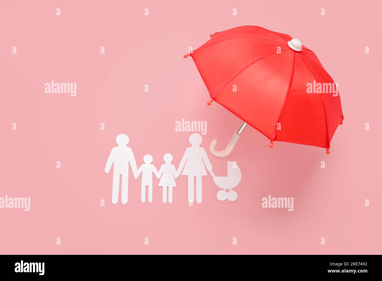 Figures of family with mini umbrella on pink background. Insurance ...