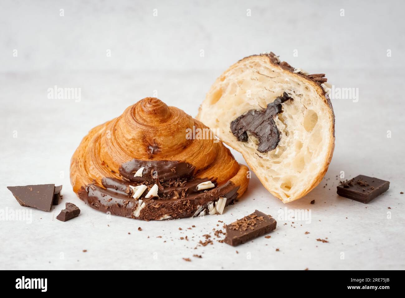 Sweet croissant with chocolate on white background Stock Photo - Alamy