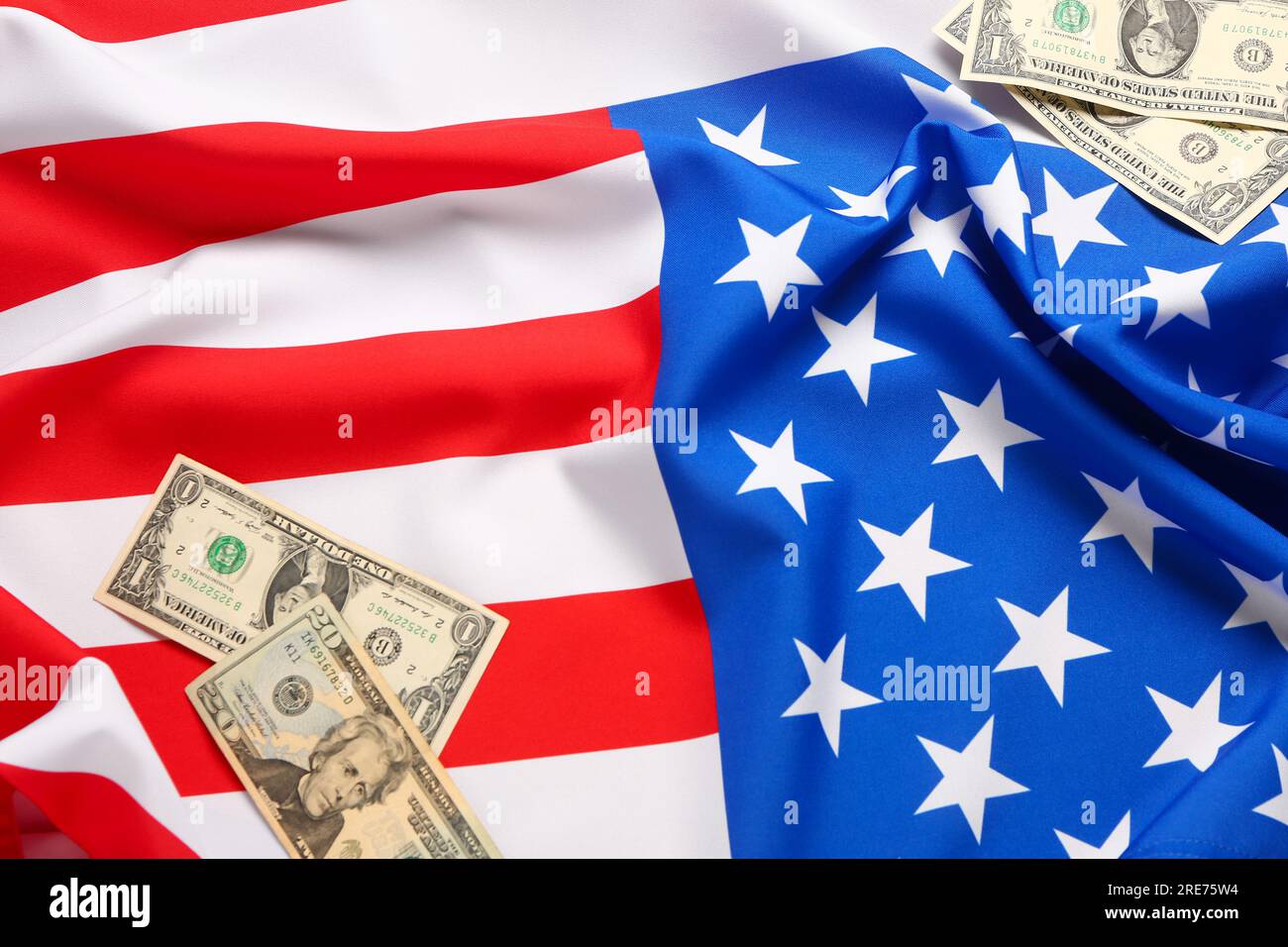 Flag of USA and dollar banknotes Stock Photo - Alamy