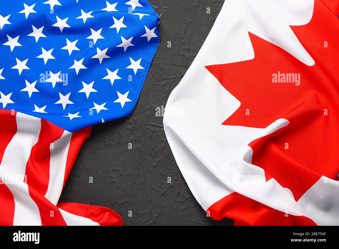 Flags of USA and Canada on black background Stock Photo - Alamy
