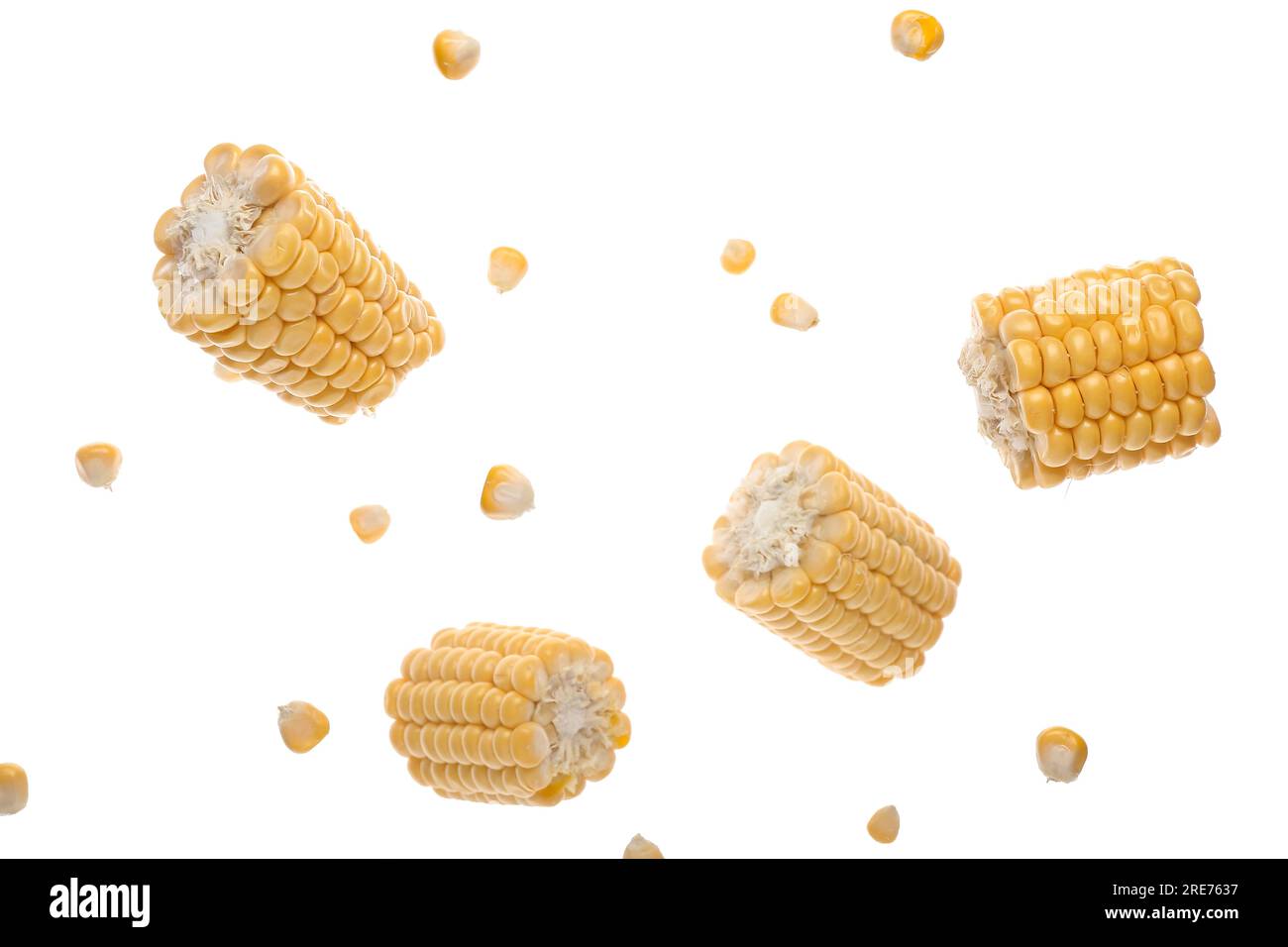 Flying cut corn cobs and kernels on white background Stock Photo - Alamy