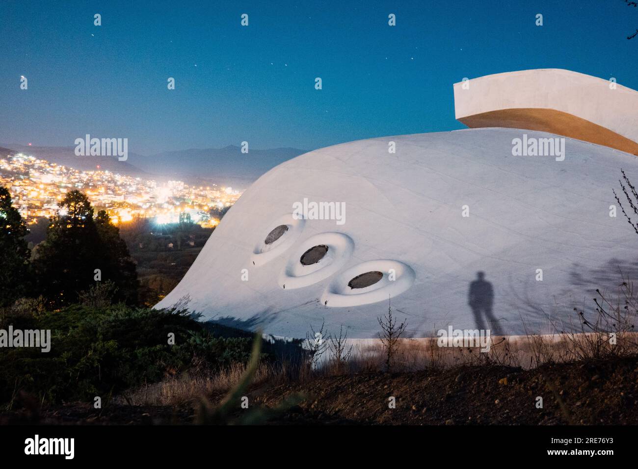 a man's shadow on the Ossuary Monument (Spomenik Kosturnica) in Veles ...