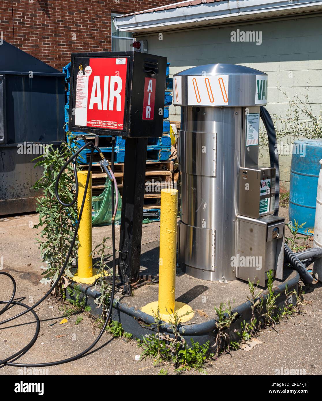 A coin operated car vacuum and air machine at a gas station in ...