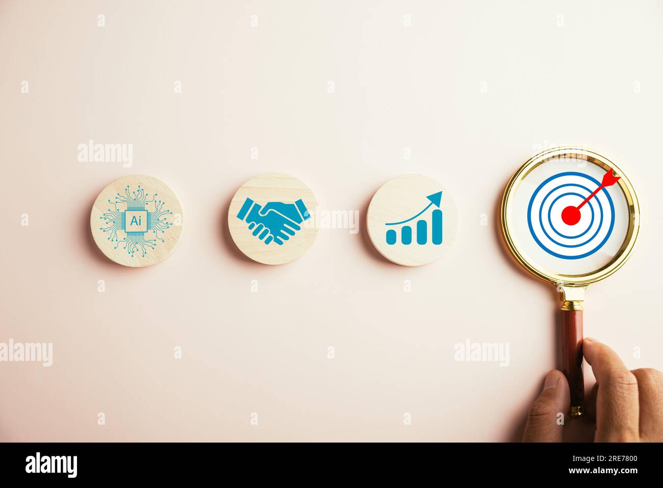 Target icon under magnifying glass Stock Photo - Alamy