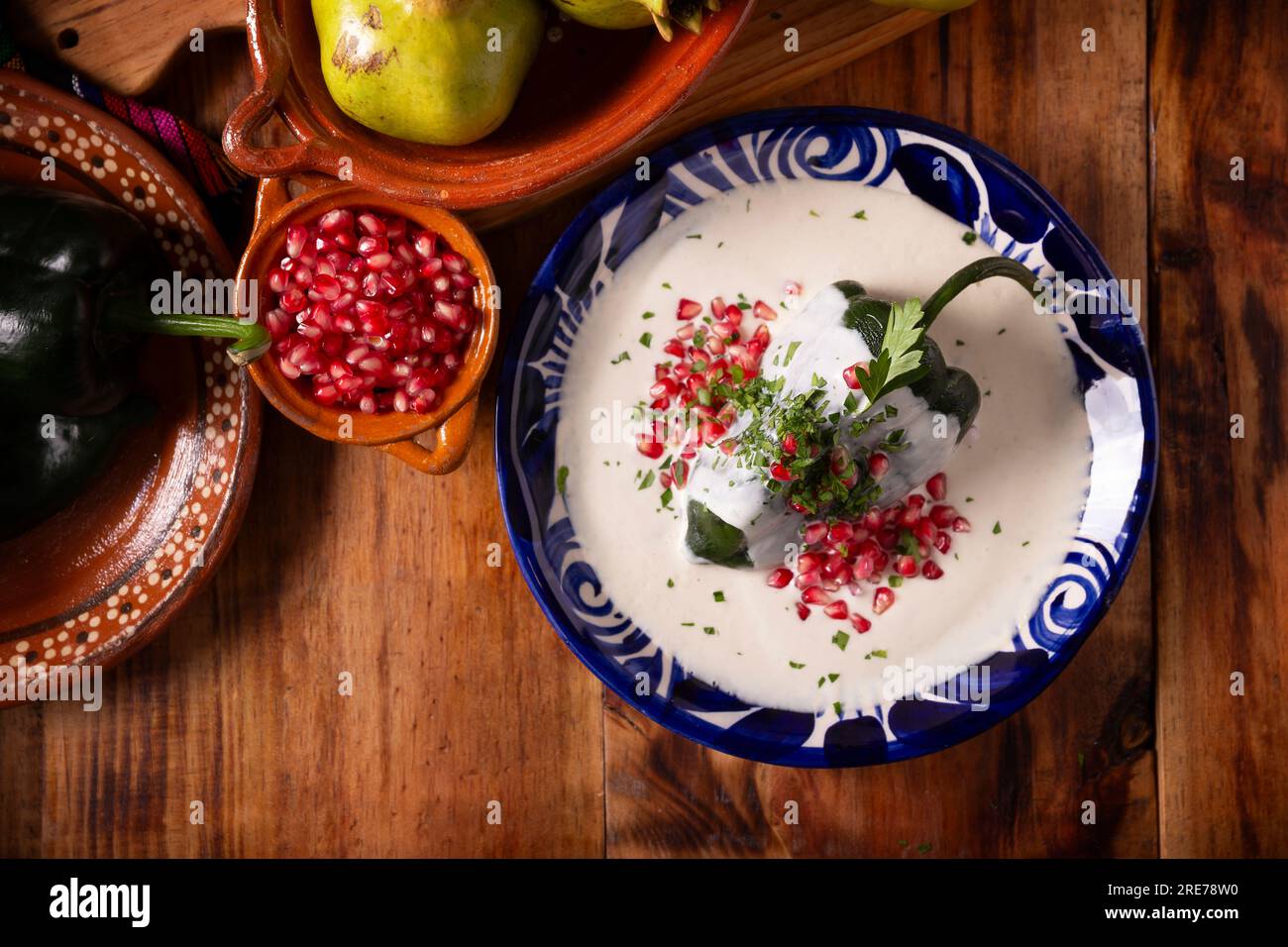 Chiles en Nogada, Typical dish from Mexico. Prepared with poblano chili ...