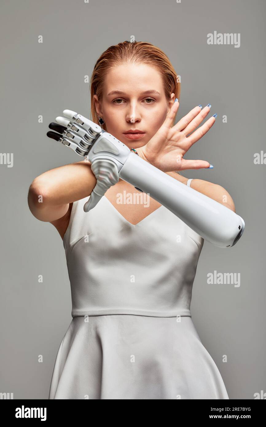 Studio portrait of beautiful young girl with disability wearing sensory ...