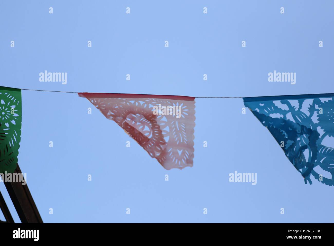 colorful handmade tissues hanging on a clothes rope Stock Photo - Alamy