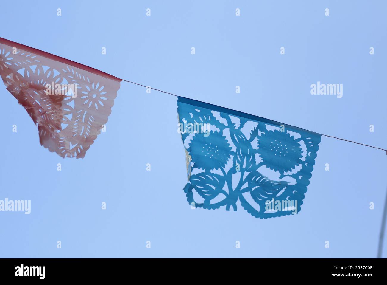 colorful handmade tissues hanging on a clothes rope Stock Photo - Alamy