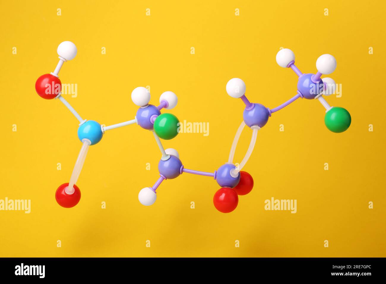 Structure of molecule on yellow background. Chemical model Stock Photo ...