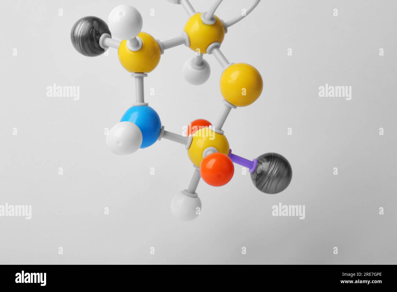 Structure of molecule on white background, closeup. Chemical model ...