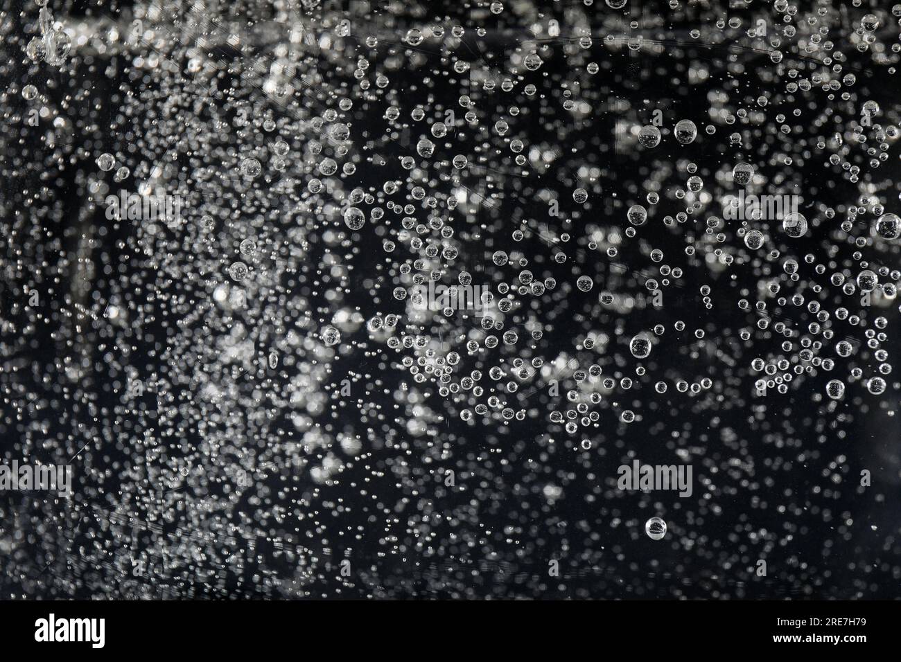 Clear soda water against black background, closeup Stock Photo - Alamy