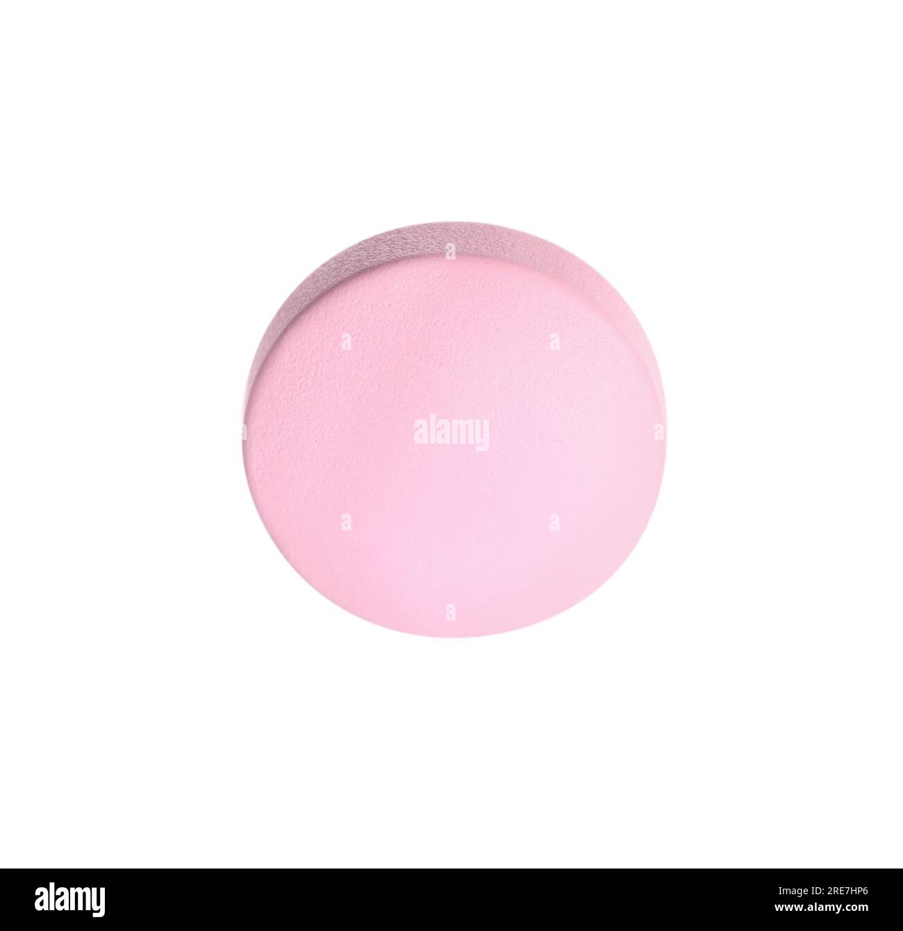 One pink pill on white background. Medicinal treatment Stock Photo - Alamy