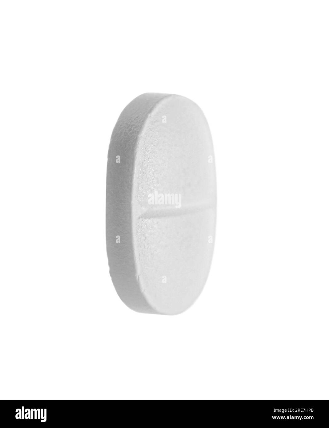 One pill isolated on white. Drug therapy Stock Photo - Alamy