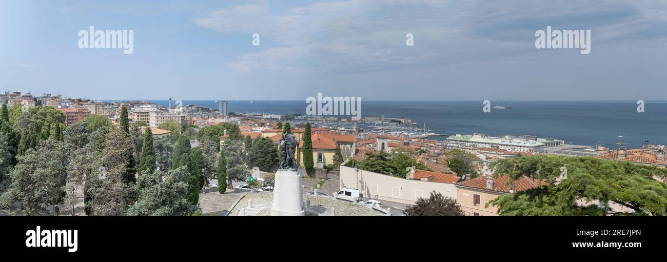 aerial cityscape of Trieste and its gulf, shot in bright light looking ...