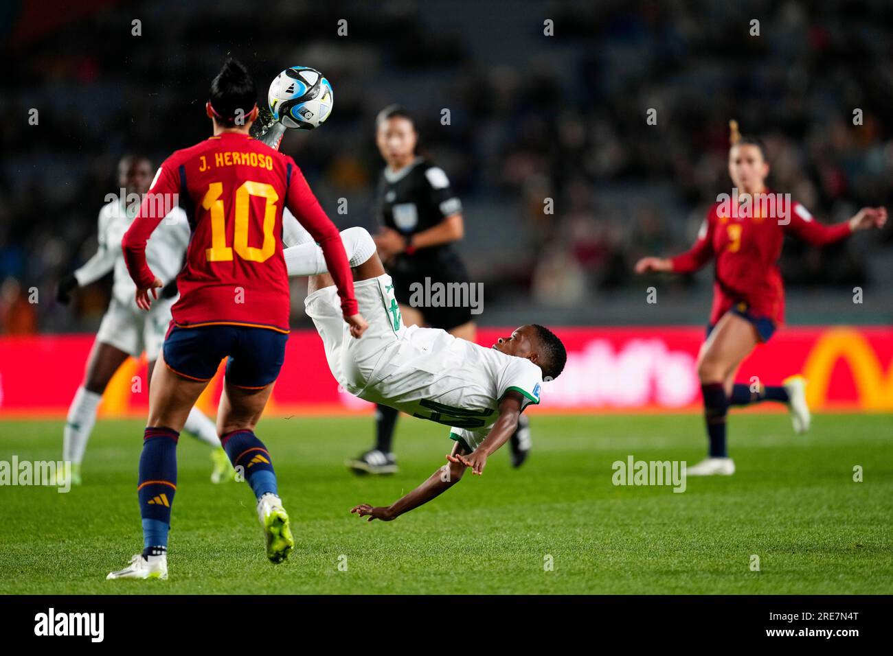 Zambia's Susan Banda clears the ball away with an overhead kick during ...