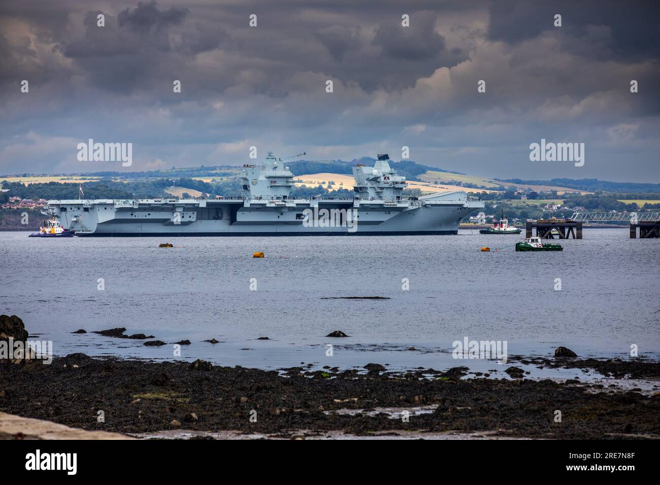 The British aircraft carrier HMS Prince of Wales (R09) passing down the ...
