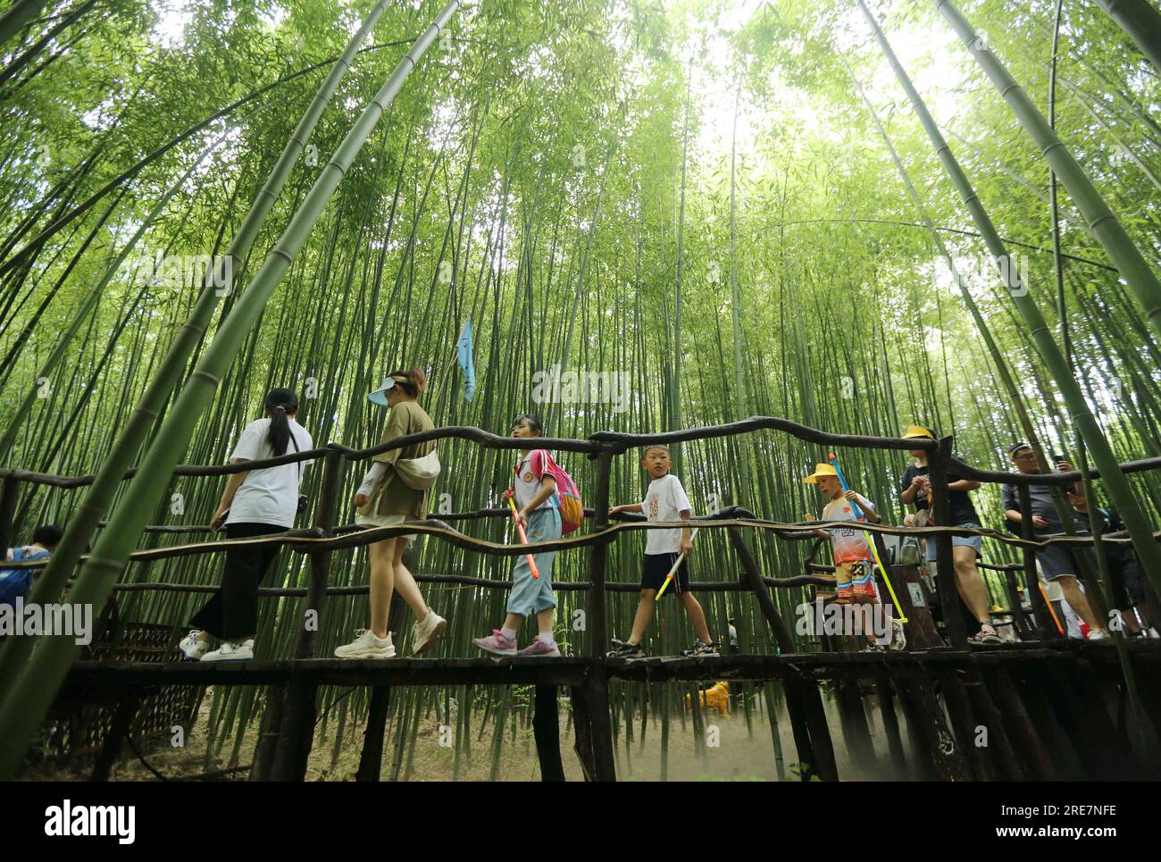 Chongqing, China's Shandong Province. 15th July, 2023. Tourists enjoy ...