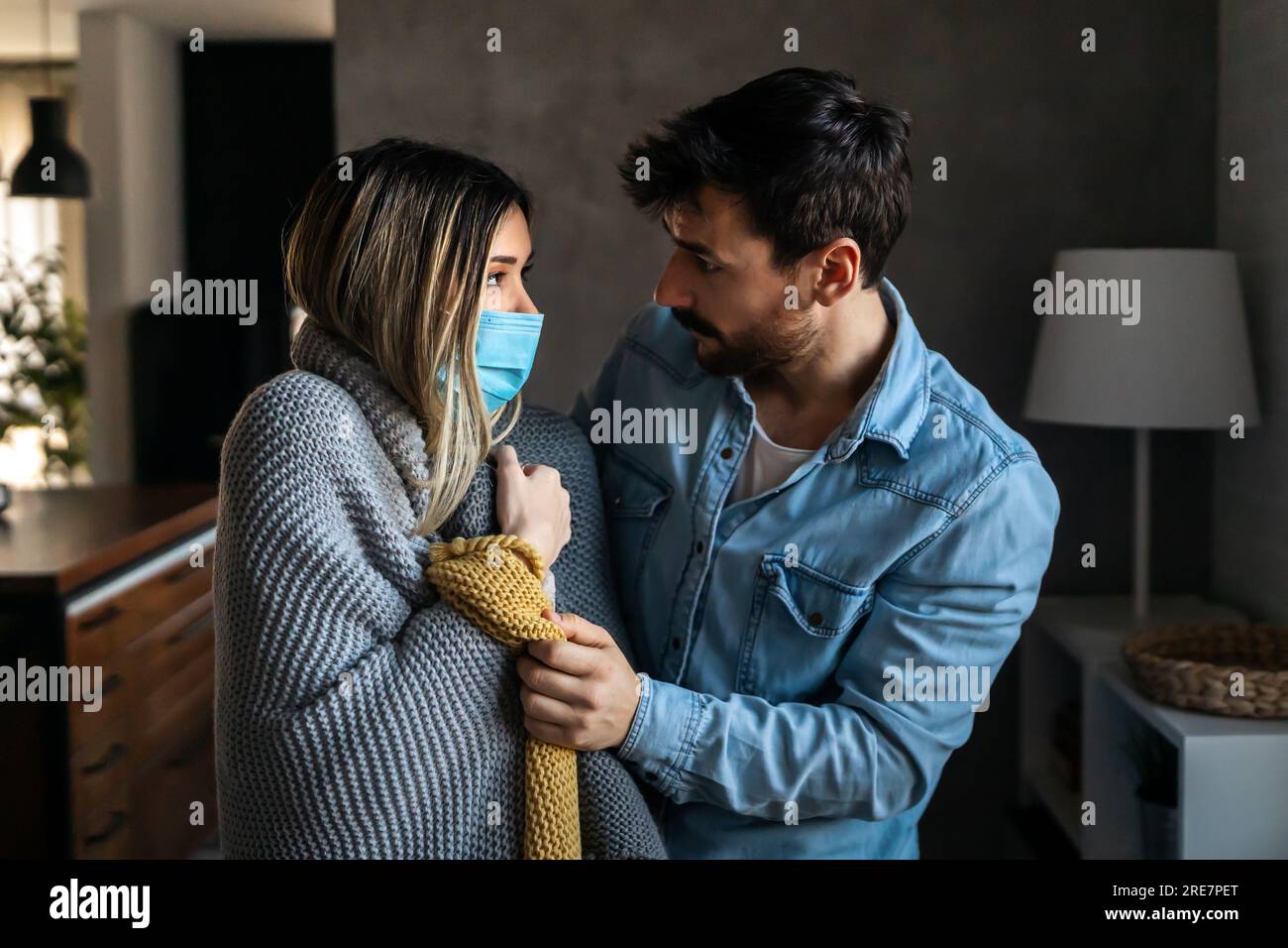 Woman taking husband temperature hi-res stock photography and images ...