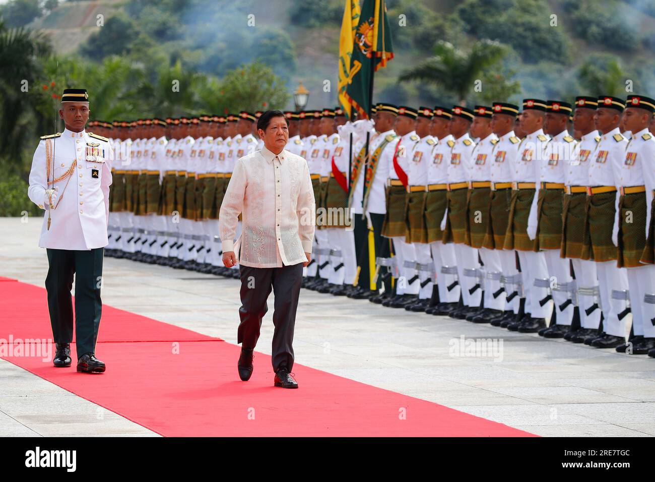 Philippine President Ferdinand Marcos Jr., right, inspects the Royal ...